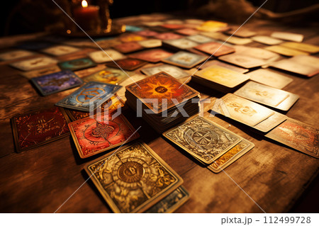 Mystical array of ancient tarot cards laid out...のイラスト素材 [112499728 ...