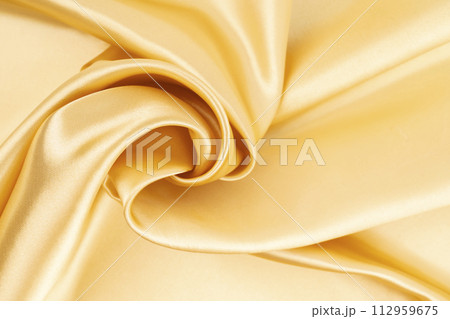 Golden color silk textile background.の写真素材 [112959675] - PIXTA