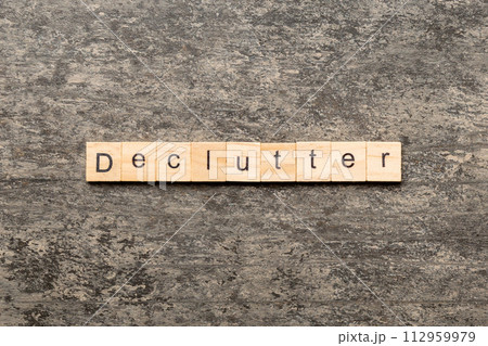 Declutter word written on wood block. Declutter...の写真素材 [112959979] - PIXTA