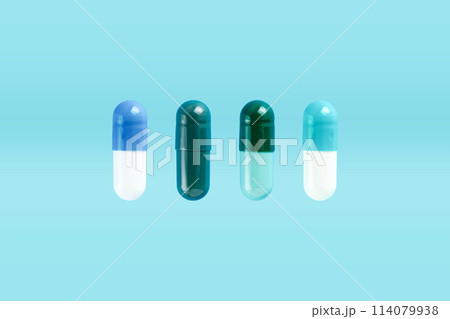 Various two-piece hard starch capsule on blue...の写真素材 [114079938] - PIXTA