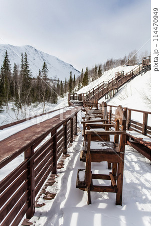 winter cafe, wooden tables and chairs under snowの写真素材 [114470949] - PIXTA