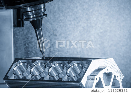 The 5-axis machining center cutting the V8...の写真素材 [115629581] - PIXTA