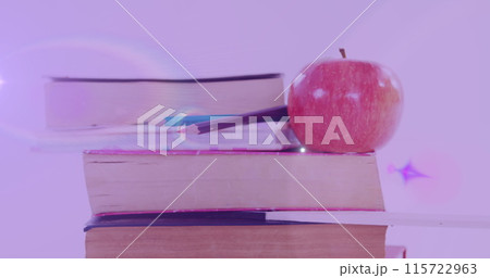 Image of glowing light over apple on stack of...のイラスト素材 [115722963] - PIXTA