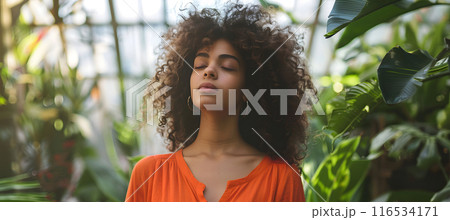 Mulatto woman in orange tunic standing with...のイラスト素材 [116534171] - PIXTA