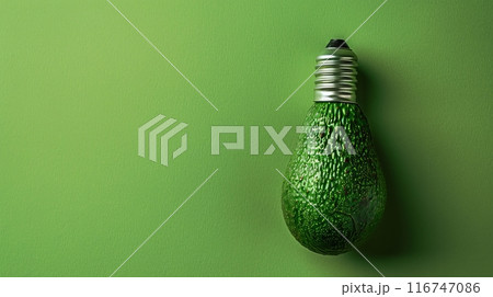 Avocado shaped light bulb on green background,...のイラスト素材 [116747086 ...