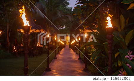 A serene, torch-lit path leads to a ceremonial...のイラスト素材 [116922005 ...