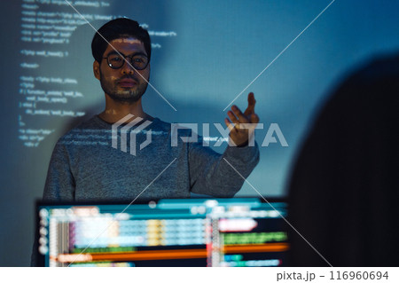 Indian man programmer standing in front of a...の写真素材 [116960694] - PIXTA