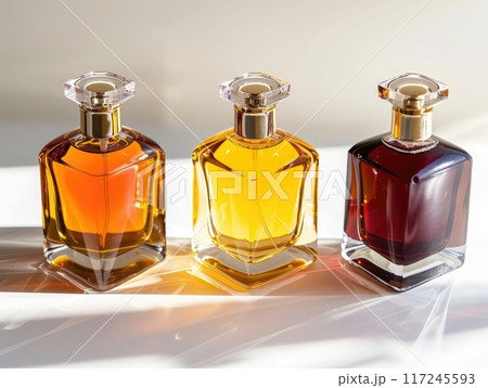 Three distinct perfume bottles showcase rich...のイラスト素材 [117245593] - PIXTA