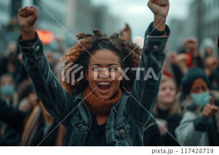 Young woman leads crowd in protest Shouting and...のイラスト素材 [117428719 ...