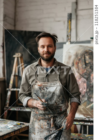 Confident male painter with a beard posing in...のイラスト素材 [118251384] - PIXTA