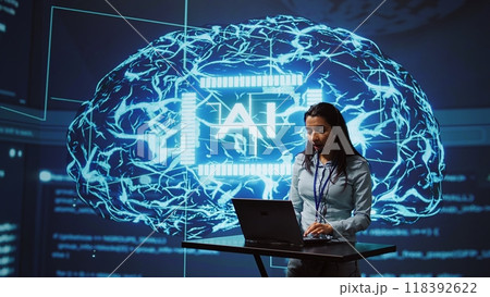 Technician in high tech workspace managing call...の写真素材 [118392622] - PIXTA