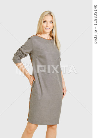 Portrait of stylish woman in a knee-length...の写真素材 [118835140] - PIXTA