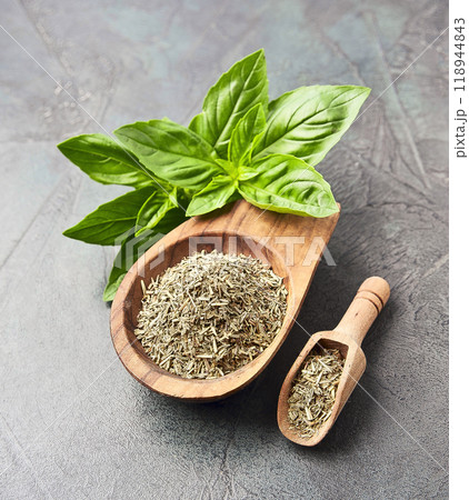 Dried basil herbs on concrete backgroundsの写真素材 [118944843] - PIXTA