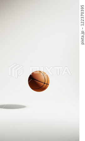 Classic orange basketball levitating gracefully...のイラスト素材 [122370395 ...