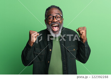 Middle-aged Black man celebrating against a...のイラスト素材 [122392288] - PIXTA