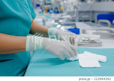 Nurse carefully dressing a forearm wound with...のイラスト素材 [122664262] - PIXTA