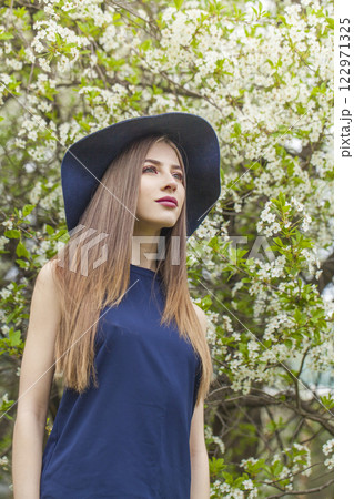 Happy spring lady. Beautiful woman outdoors...の写真素材 [122971325] - PIXTA