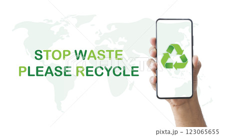 Mobile phone in hand stop waste please recycle....の写真素材 [123065655] - PIXTA