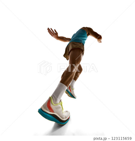Rear view of athlete running with dynamic...の写真素材 [123115659] - PIXTA
