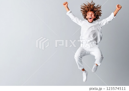 Young man jumps for joy celebrating his first...のイラスト素材 [123574511] - PIXTA