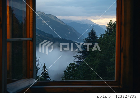 Open window is framing a breathtaking mountain...のイラスト素材 [123827835 ...
