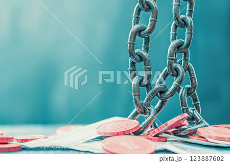 Chains symbolize financial struggle, with coins...のイラスト素材 [123887602 ...