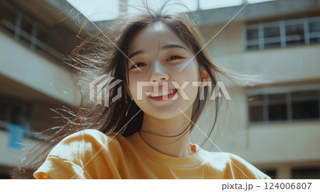 Cheerful chinese student grinning, hair flowing...のイラスト素材 [124006807 ...