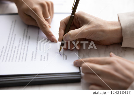 Hands of business partners signing contract,...の写真素材 [124218417] - PIXTA