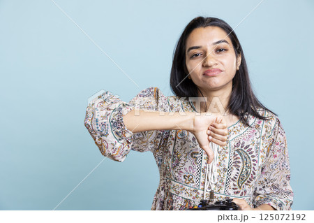 Indian displeased girl feels disappointed after...の写真素材 [125072192] - PIXTA