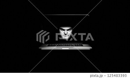 A menacing figure stares from a laptop screen,...のイラスト素材 [125483393 ...