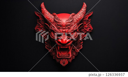 Red Japanese demon mask sculpture against black...のイラスト素材 [126336937 ...