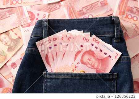 Chinese yuan 100 banknotes in jeans back...の写真素材 [126356222] - PIXTA