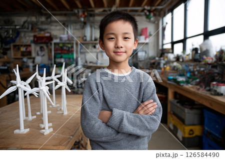 child prodigy scientist designing wind turbine...のイラスト素材 [126584490 ...