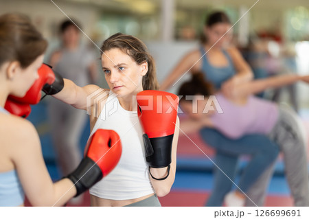 Female co-participant and woman sparring...の写真素材 [126699691] - PIXTA