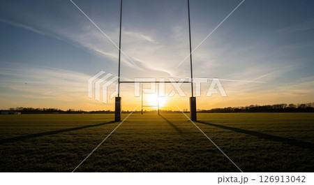 Rugby goalposts in a grassy field at sunset,...のイラスト素材 [126913042] - PIXTA
