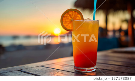 Orange red cocktail with straw and orange slice...のイラスト素材 [127178087 ...