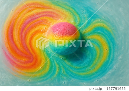 Rainbow bath bomb dissolving in water creating...のイラスト素材 [127791633 ...