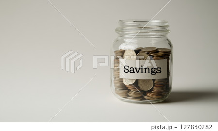Coins filling a glass savings jar represent...のイラスト素材 [127830282] - PIXTA