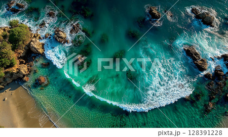 Turquoise ocean waves pounding rocky coastline...のイラスト素材 [128391228 ...