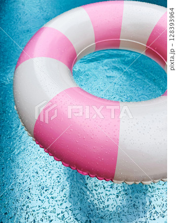 Swimming ring with pink and white stripes in a...の写真素材 [128393964] - PIXTA