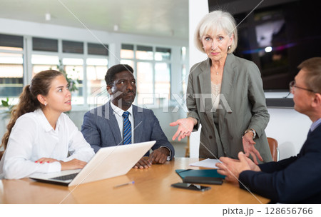 Positive business partners engaged in...の写真素材 [128656766] - PIXTA