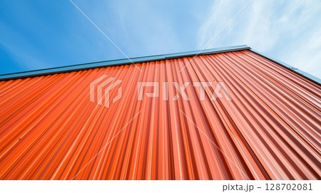 Wall of warehouse orange metal building against...のイラスト素材 [128702081 ...