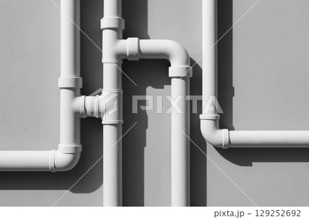 White plumbing pipes interconnected against a...のイラスト素材 [129252692] - PIXTA