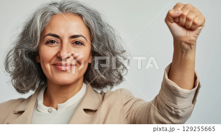 Middle aged latin american woman with raised...のイラスト素材 [129255665] - PIXTA