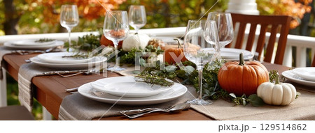 Delightful autumn dinner arrangement outdoors...のイラスト素材 [129514862] - PIXTA