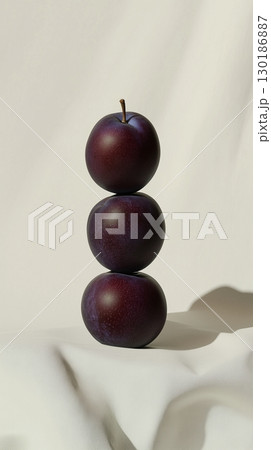 A stack of plum fruit balancing on top with...のイラスト素材 [130186887] - PIXTA
