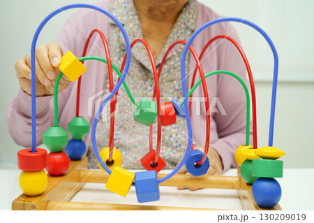 Asian elderly woman playing enhancing skill...の写真素材 [130209019] - PIXTA