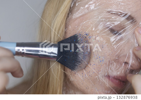 Microplastics in cosmetics. A woman applied a...の写真素材 [132876938] - PIXTA