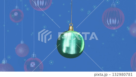 Hanging green metallic bauble on string before...のイラスト素材 [132980781 ...